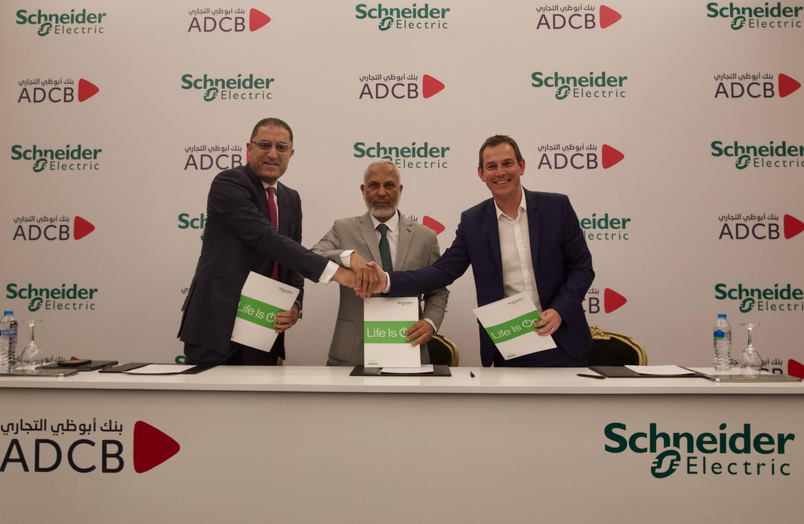 Abu Dhabi Commercial Bank, Schneider Electric sign two MoUs to finance ...